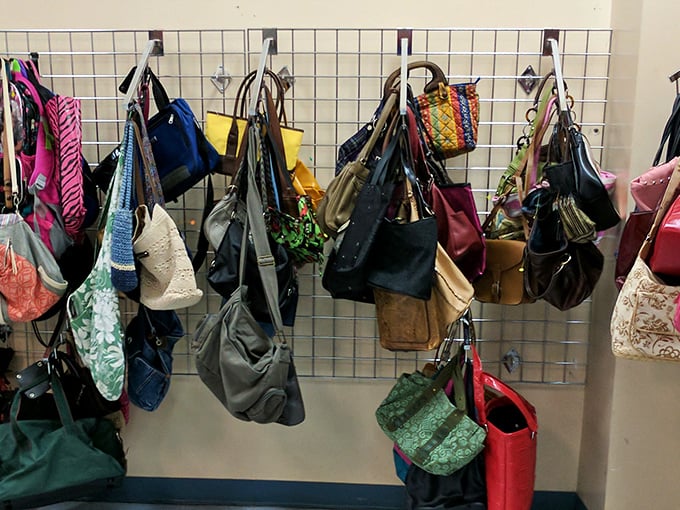 Handbag heaven hanging in suspended animation. Designer dreams and practical carryalls waiting for someone to take them home for less than a fancy coffee.