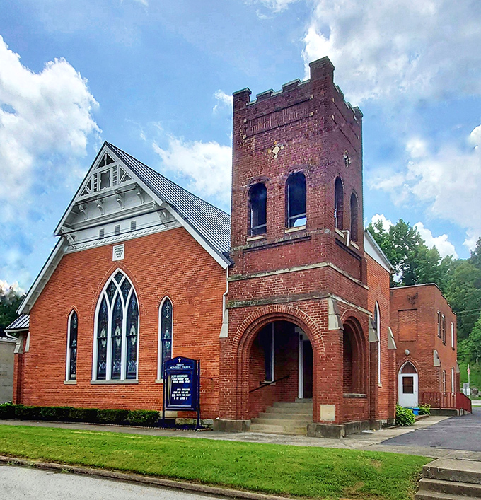 The Trinity Methodist Church stands as an architectural gem, its red brick tower reaching skyward as it has for generations of Augusta residents.