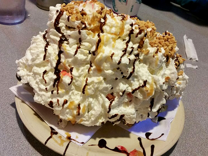 Not so much a dessert as a mountain of whipped cream with chocolate trails and caramel rivers. Spoons up, dignity down.
