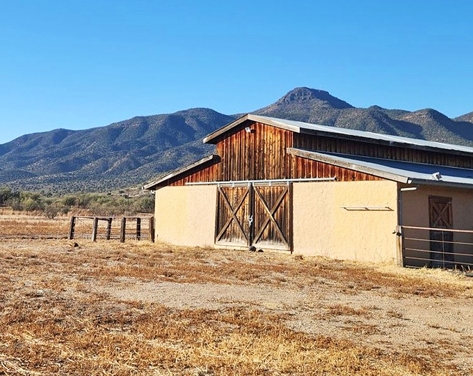 This isn't just a barn&mdash;it's a time machine to Arizona's ranching past, standing proud against mountain backdrops.