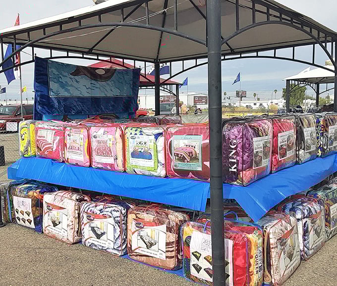 Bedding bonanza! Colorful comforter sets stacked like layers of a particularly cozy cake, ready to transform bedrooms across Arizona.
