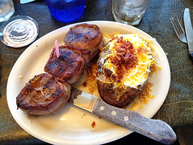 Medallions of beef that could make a vegetarian question their life choices, paired with a loaded baked potato that's a meal unto itself.