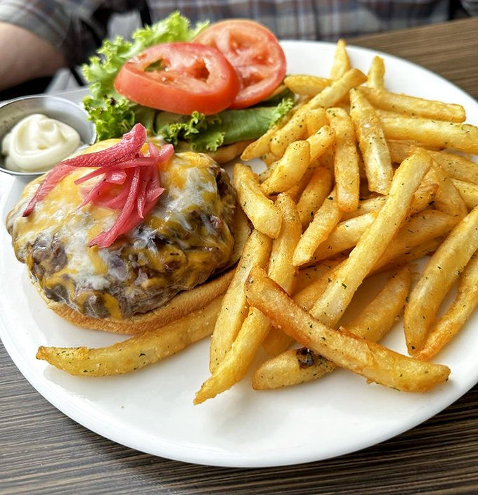 The burger that launched a thousand hikes&mdash;juicy, cheese-draped perfection that makes you understand why bison look so pleased with themselves.
