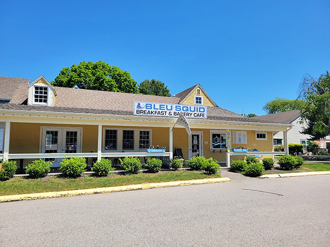 The cheerful yellow facade of Bleu Squid promises breakfast delights that'll make you wonder why you ever settled for cereal.