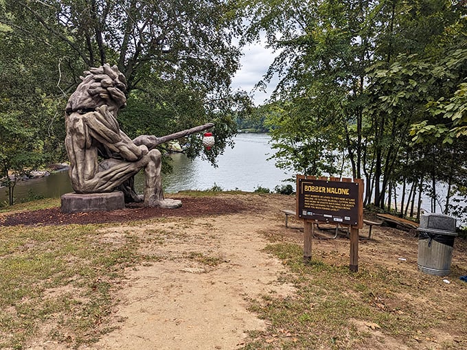 Bobber Malone demonstrates perfect fishing form with his trusty rod. He's caught everything from bluegill to tall tales in these waters.