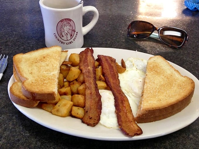 The breakfast trinity &ndash; perfectly cooked eggs, crispy bacon, and golden toast &ndash; served with a side of Vermont morning.