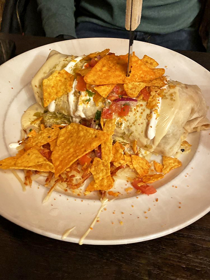 This isn't just a burrito&mdash;it's a flavor fiesta wrapped in a tortilla blanket, topped with crunchy chips. Breakfast that demands both hands and your full attention.