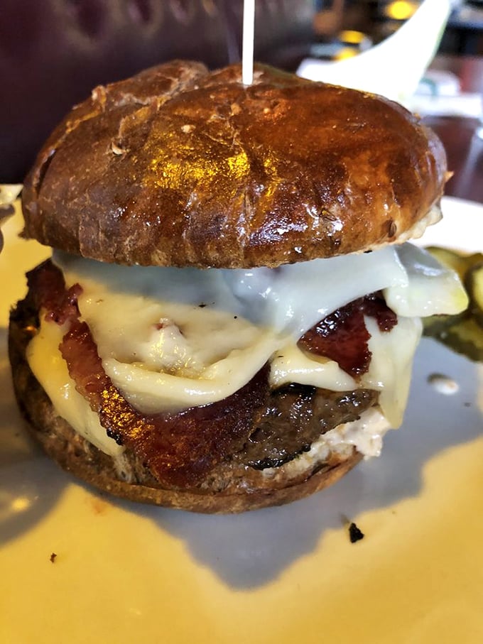 This isn't just a burger; it's a masterclass in indulgence. Irish cheddar and bacon on a brioche throne &ndash; royalty you can eat with your hands.