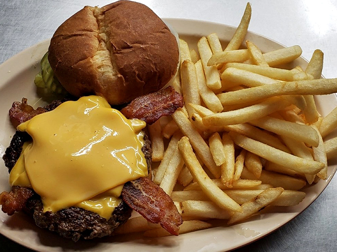 A burger that would make The King himself nod in approval&mdash;cheese melting like a sunset over bacon-topped perfection.