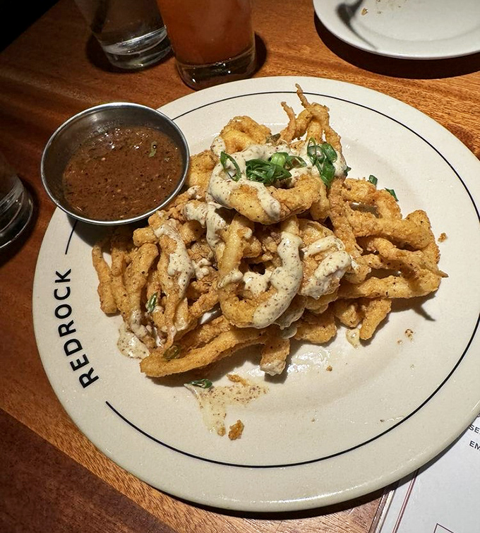 Crispy calamari that defies the landlocked state stereotype&mdash;proof that good seafood can happen anywhere with the right touch.