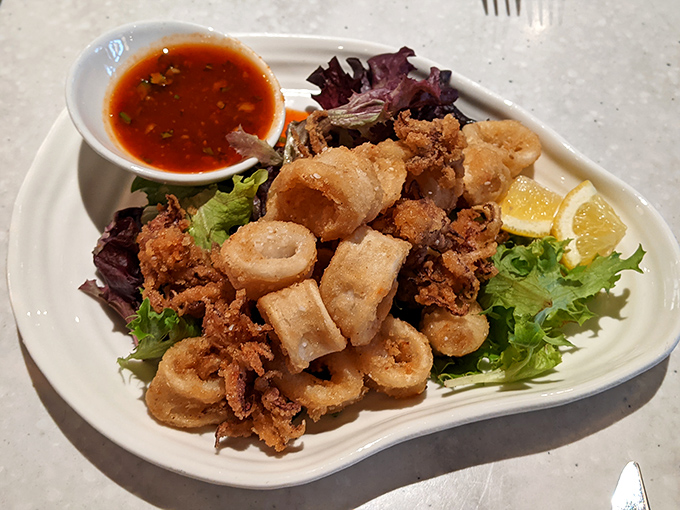 Fried calamari done right, tender rings that prove not all seafood needs to come from the nearest ocean to be spectacular.