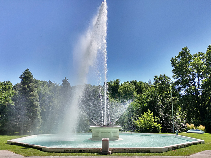 Central Park's fountain creates an oasis of tranquility. On hot Nebraska afternoons, the mist feels like nature's air conditioning.