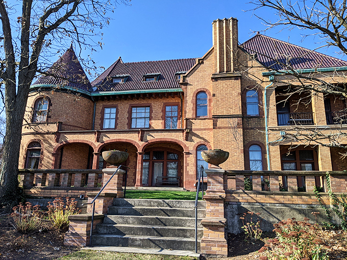 The Charles Gates Dawes House flaunts its Romanesque Revival splendor, a brick testament to the days when architectural details weren't considered optional extras.