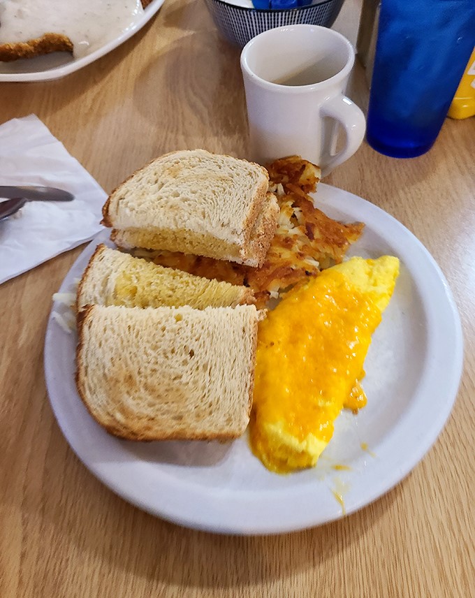 Sunshine on a plate&mdash;this cheese omelet with toast delivers that simple, perfect breakfast satisfaction that fancy brunch spots try desperately to replicate.