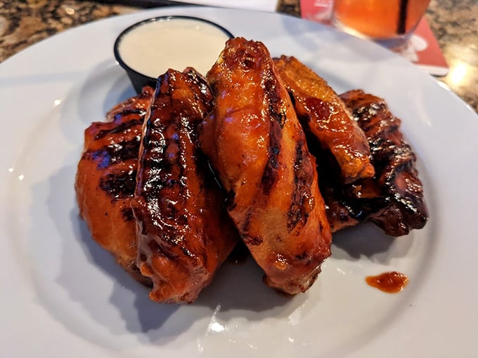 These chicken wings aren't just cooked&mdash;they're transformed into glossy, sticky-sweet morsels that demand to be devoured with reckless abandon.