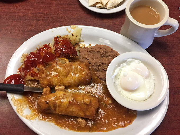 A Mexican breakfast fiesta featuring chile rellenos, beans, and eggs—the morning equivalent of hitting the flavor jackpot.