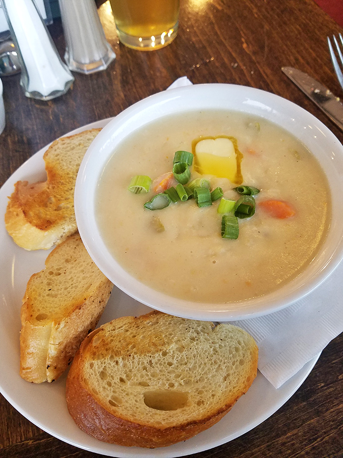 A bowl of seafood chowder that could warm the coldest Alaskan day, with chunks of treasure hiding beneath that creamy surface.