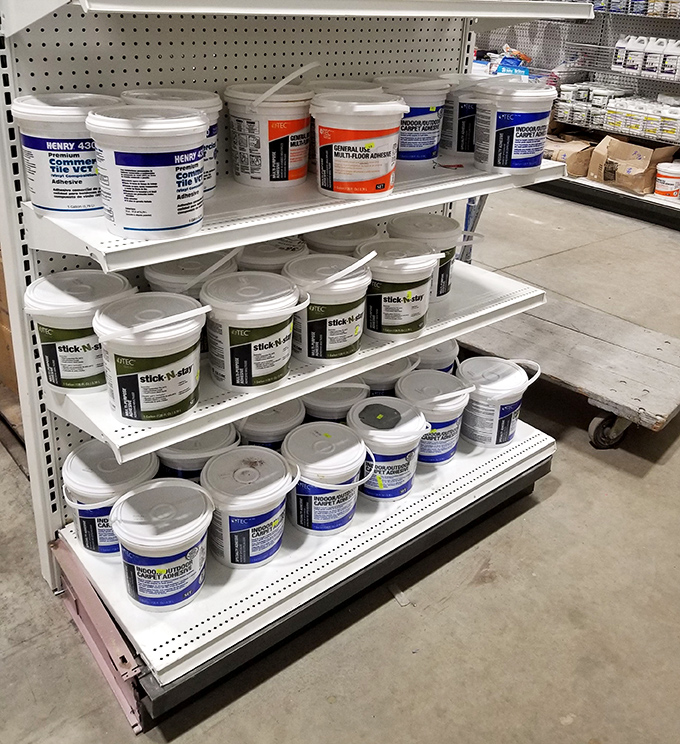 DIY paradise in buckets. The adhesive section proves one person's "too much" becomes another's "just enough" for that weekend project.