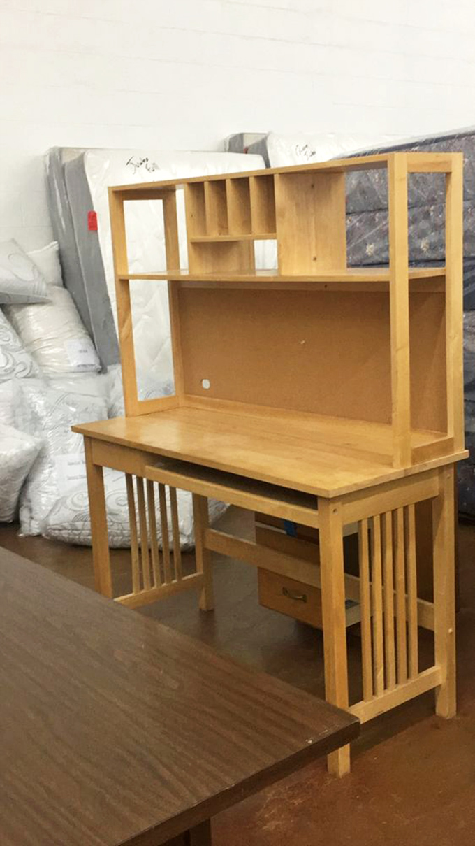 This desk has more organizational potential than your New Year's resolutions, and it costs about the same as brunch.