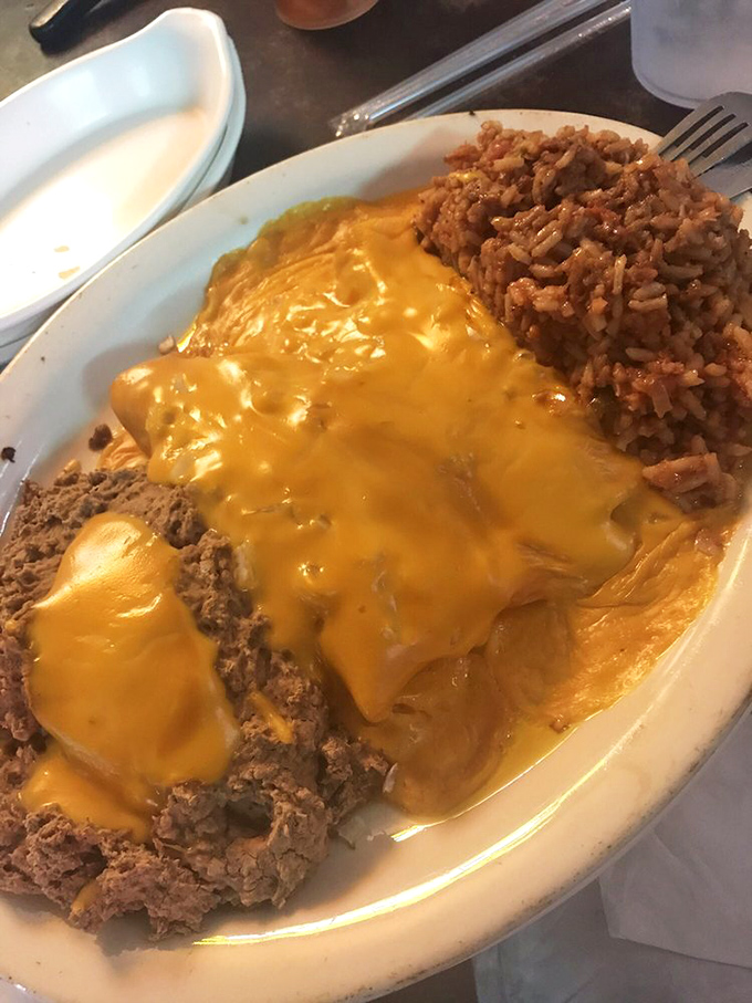 Melted cheese blankets this hearty plate like a Texas sunset. Who needs fancy when you have this much flavor?