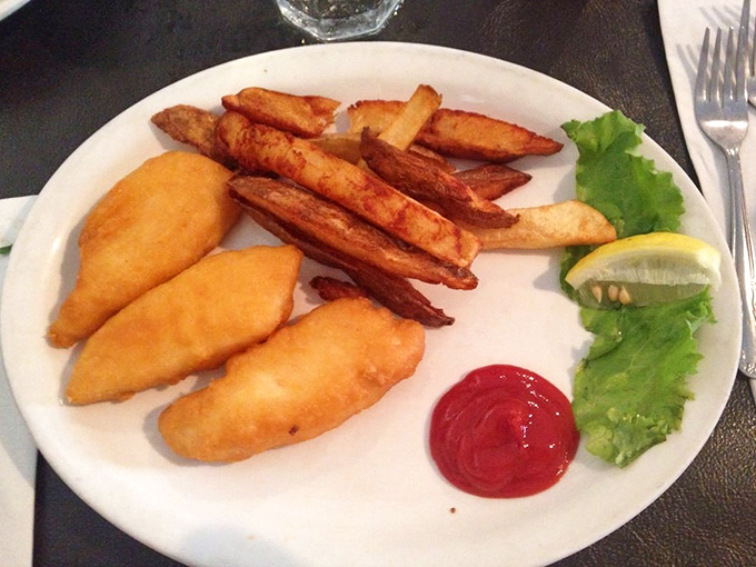 Golden-battered fish that crunches like autumn leaves, with fries so perfectly crisp they deserve their own fan club.