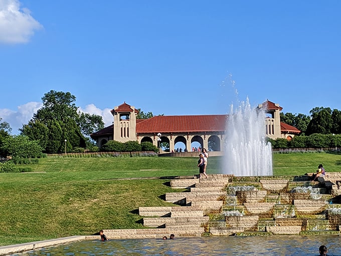 Forest Park's grand pavilion and cascading fountain create a scene straight from a vintage postcard, where St. Louisans have been making memories for generations.