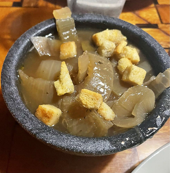 French onion soup that doesn't just warm your body but hugs your soul&mdash;those floating croutons are like little flavor lifeboats.