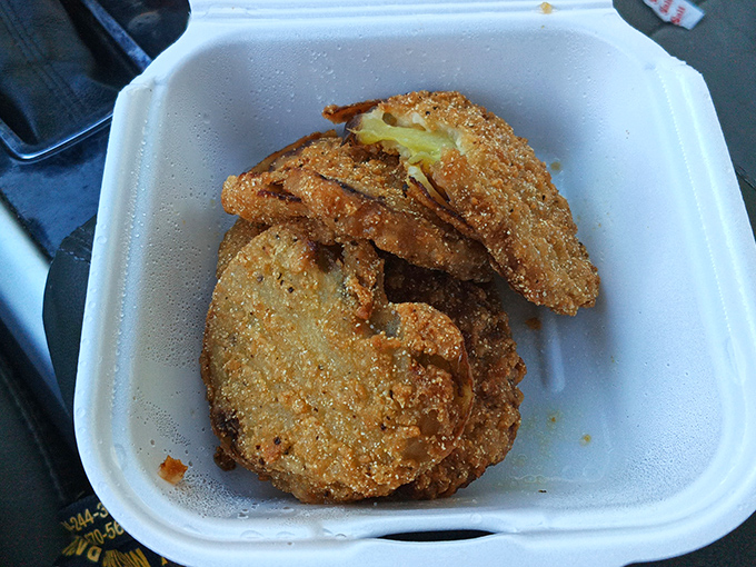 Fried green tomatoes that would make Fannie Flagg weep with joy. Crispy cornmeal exterior giving way to that signature tangy interior&mdash;the South's gift to appetizers.