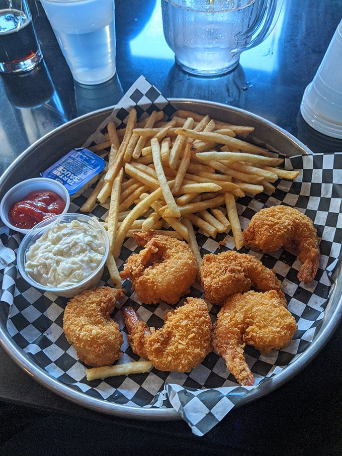 Golden-fried jumbo shrimp that crunch like they're auditioning for a Food Network show, served with fries that are the perfect supporting cast.