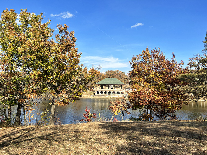 Fall foliage frames the park pavilion like nature's own Instagram filter, no smartphone required for this authentic Kansas beauty.