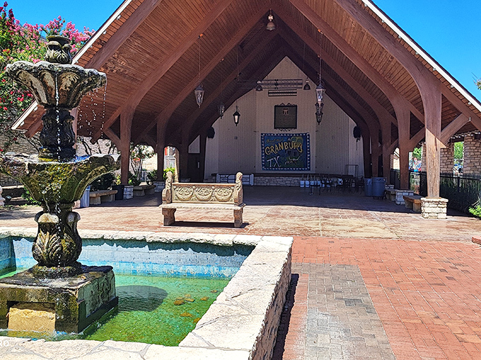 This fountain pavilion could convince even the most dedicated city-dweller that small-town life has its perks. Just listen to that water!