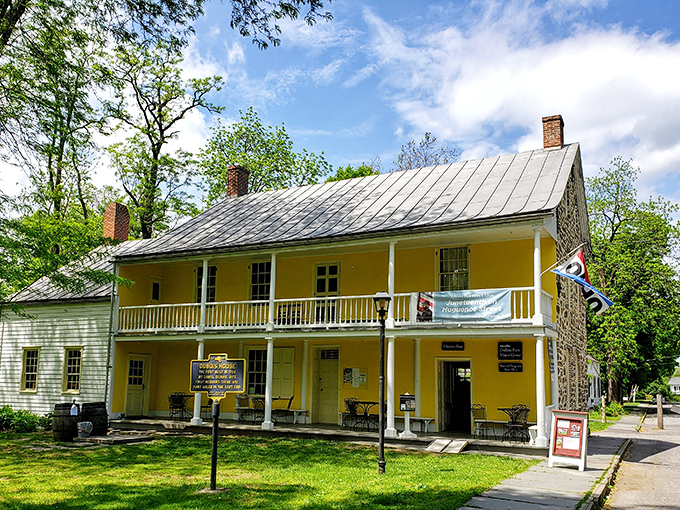 The yellow-hued historic house on Huguenot Street stands as a sun-drenched time capsule, where America's early chapters unfold for modern-day visitors.