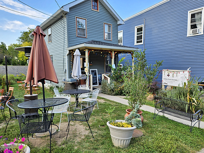 Garden dining with character&mdash;these blue cottages offer a peaceful respite where flowers and food create the perfect small-town afternoon escape.
