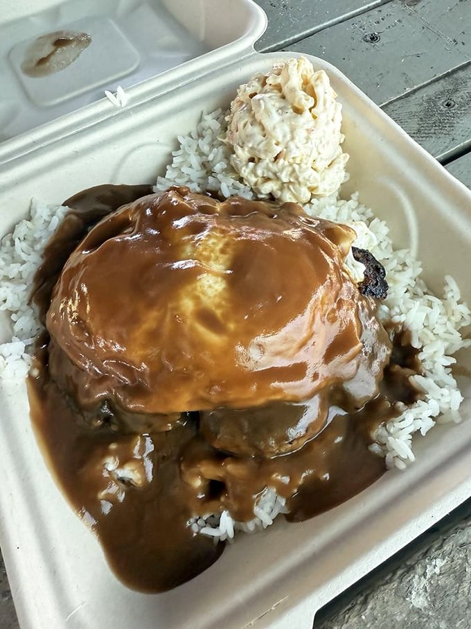 Loco moco: where a hamburger patty lounges on a bed of rice, topped with a perfectly fried egg and smothered in gravy that could make a vegetarian reconsider.