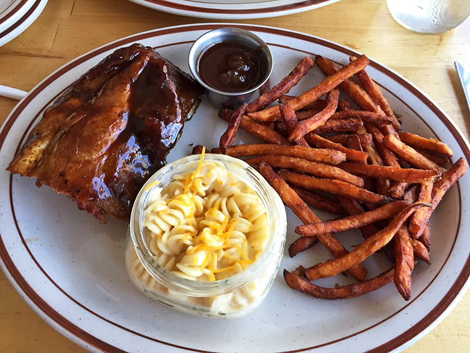 Mac and cheese served in a mason jar alongside glistening ribs? Comfort food gets elevated without losing its soul at this Wyoming smoke shack.