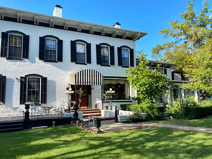 The stately Maxwell Mansion stands as a pristine example of 19th-century architecture. Its white facade and black shutters whisper stories of Gilded Age gatherings.