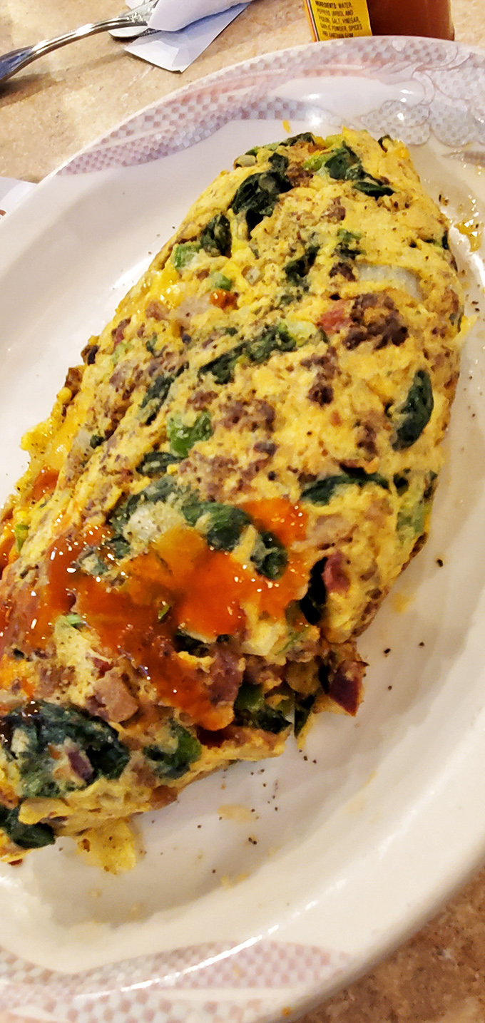 An omelet that doesn't just contain vegetables&mdash;it celebrates them in a fluffy egg embrace worthy of morning devotion.