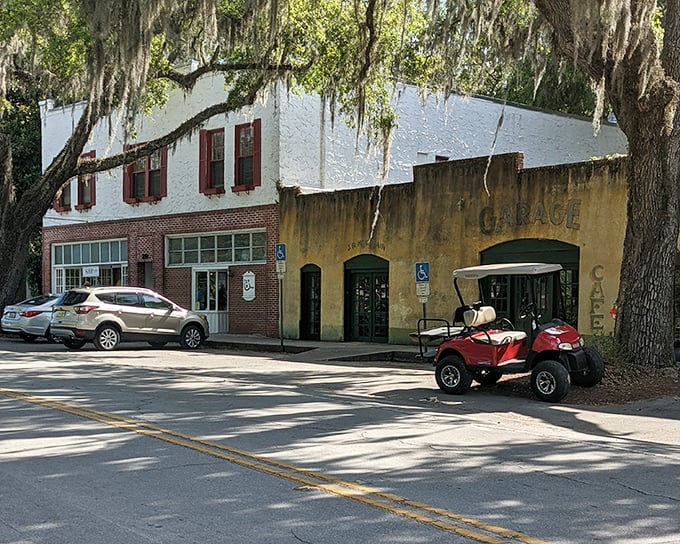 A golf cart parked outside the old Garage building &ndash; in Micanopy, even the transportation choices seem to whisper "slow down, what's your hurry?"