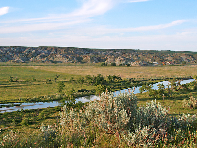 The Milk River valley unfolds like nature's screensaver&mdash;except you can fish in it, picnic beside it, and never worry about software updates.