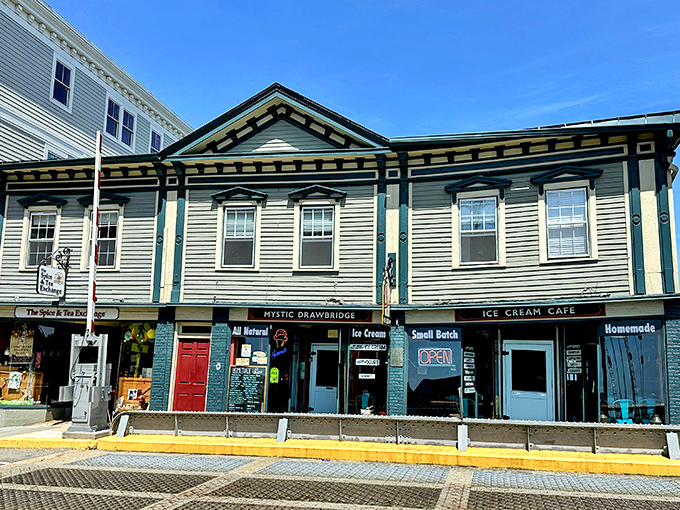 The iconic Mystic Drawbridge Ice Cream shop, where the only thing sweeter than watching the bridge rise is the homemade ice cream melting down your cone.