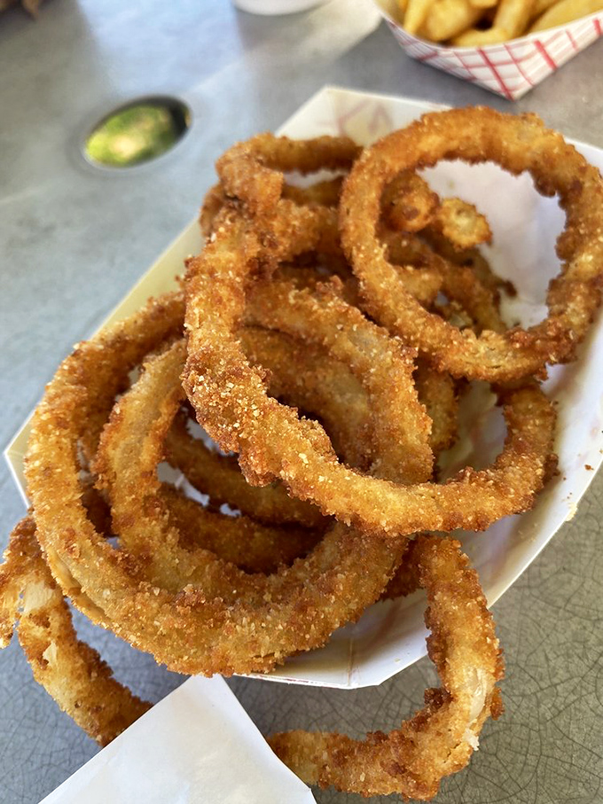 Golden rings of happiness that crunch like autumn leaves. These aren't just onion rings&mdash;they're edible jewelry for your taste buds.