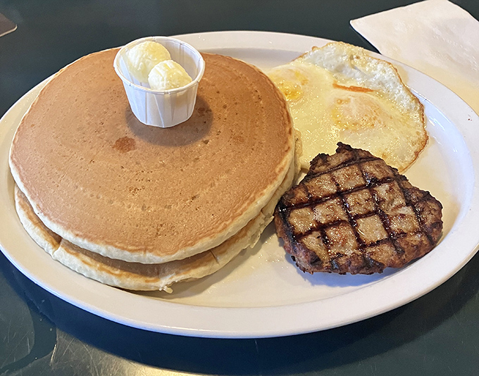 The pancake that ate Seattle, accompanied by a steak and egg that refused to be upstaged.