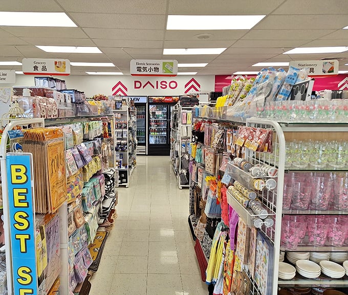 Navigate aisles organized with Japanese precision, where groceries, home accessories, and stationery create a treasure hunter's paradise.