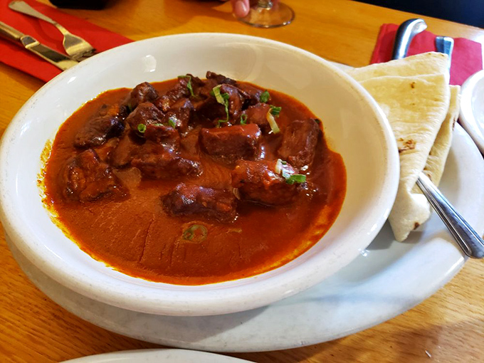 Red chile beef stew that looks like it's been simmering since the Spanish arrived, served with a tortilla that's practically begging to dive in.