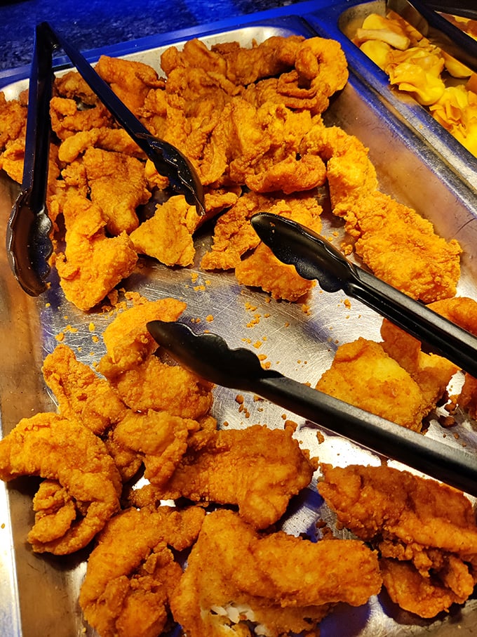 Golden-fried treasures waiting to be discovered. These crispy morsels are what buffet dreams are made of.