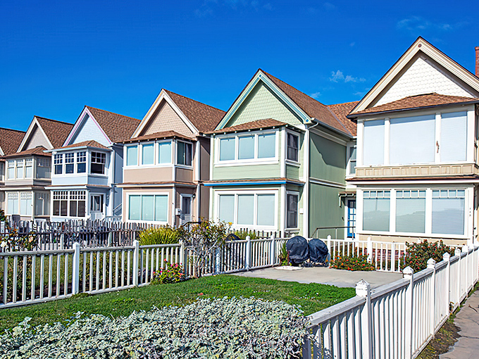 These pastel-colored homes stand like a row of sophisticated ladies at a garden party, each with the perfect view of ocean drama.