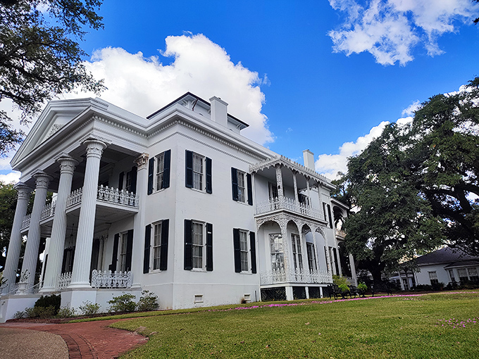 Stanton Hall stands as a gleaming white testament to antebellum architecture&mdash;like a wedding cake that survived 150 years of Mississippi summers.
