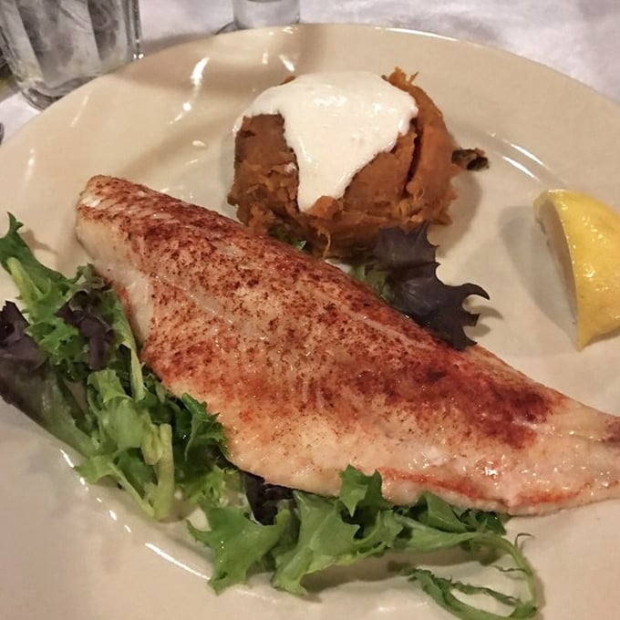 This walleye fillet is the Minnesota equivalent of celebrity royalty &ndash; perfectly bronzed, elegantly plated, and ready for its close-up. The loaded potato is its faithful sidekick.