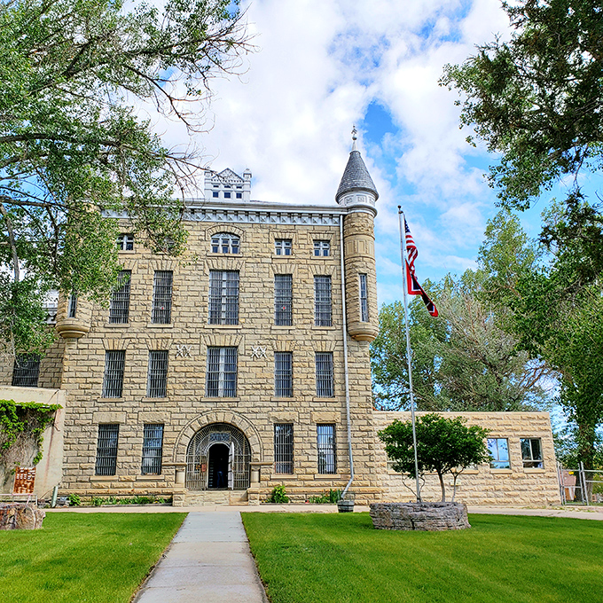 Wyoming Frontier Prison stands as a Gothic fortress where history lessons come cheap and chills are absolutely free.