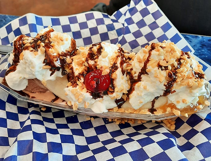 Their banana split isn't dessert—it's performance art with mountains of whipped cream, hot fudge rivers, and that perfect maraschino cherry crown.